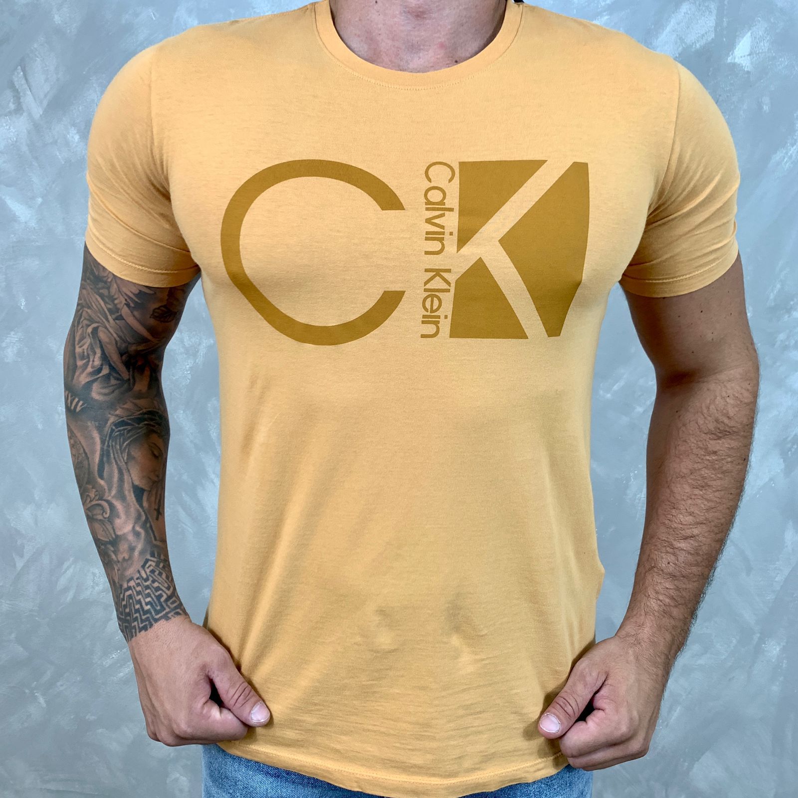 Camiseta CK Caramelo DFC | PORTAL DROP - ATACADO