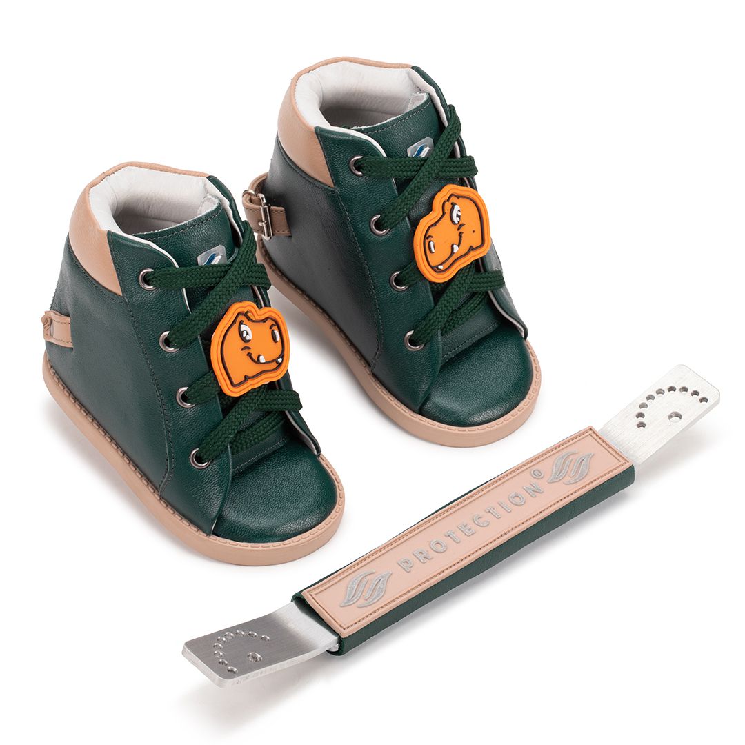 Dennis Brown Dino Verde com barra de regulagem | Orthocalce Baby & Kids